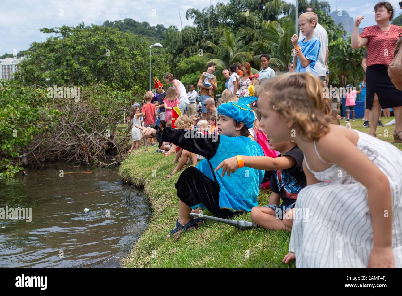 Children of the Dutch community pointing and waiting dressed up and in ...
