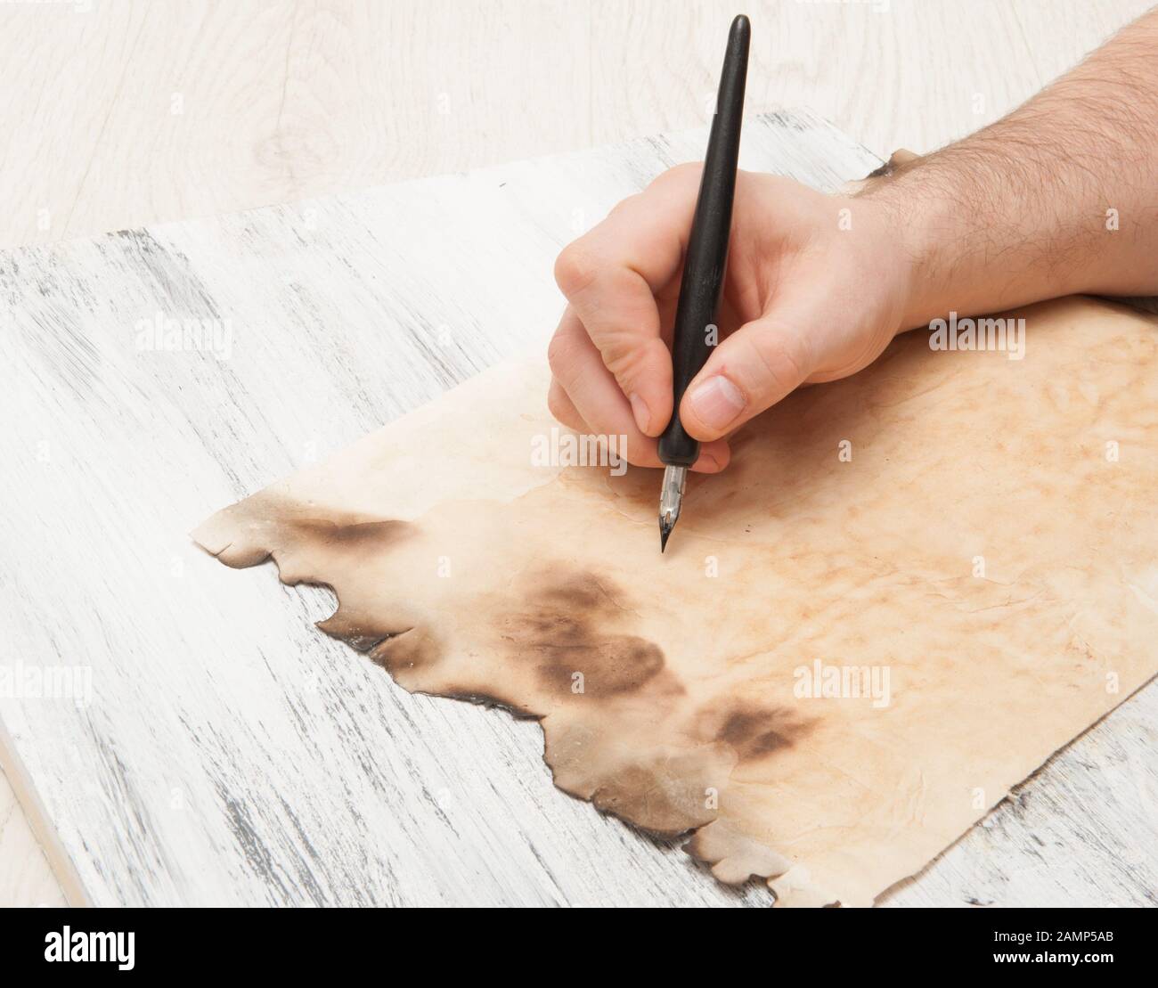 Male hand silver pen hi-res stock photography and images - Alamy