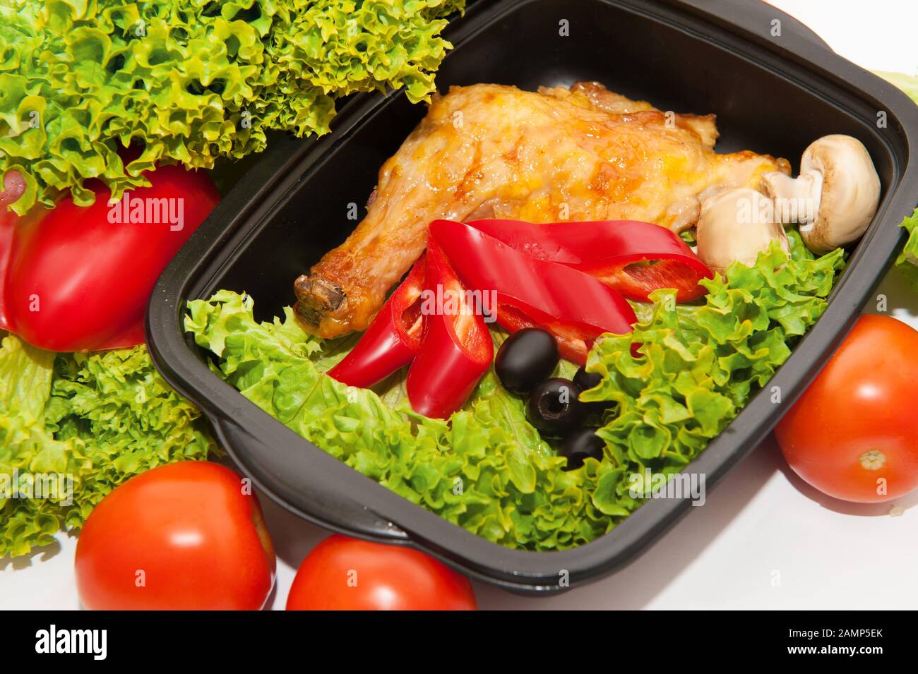 Lunch box with chicken, vegetables, salad. background with food Stock ...