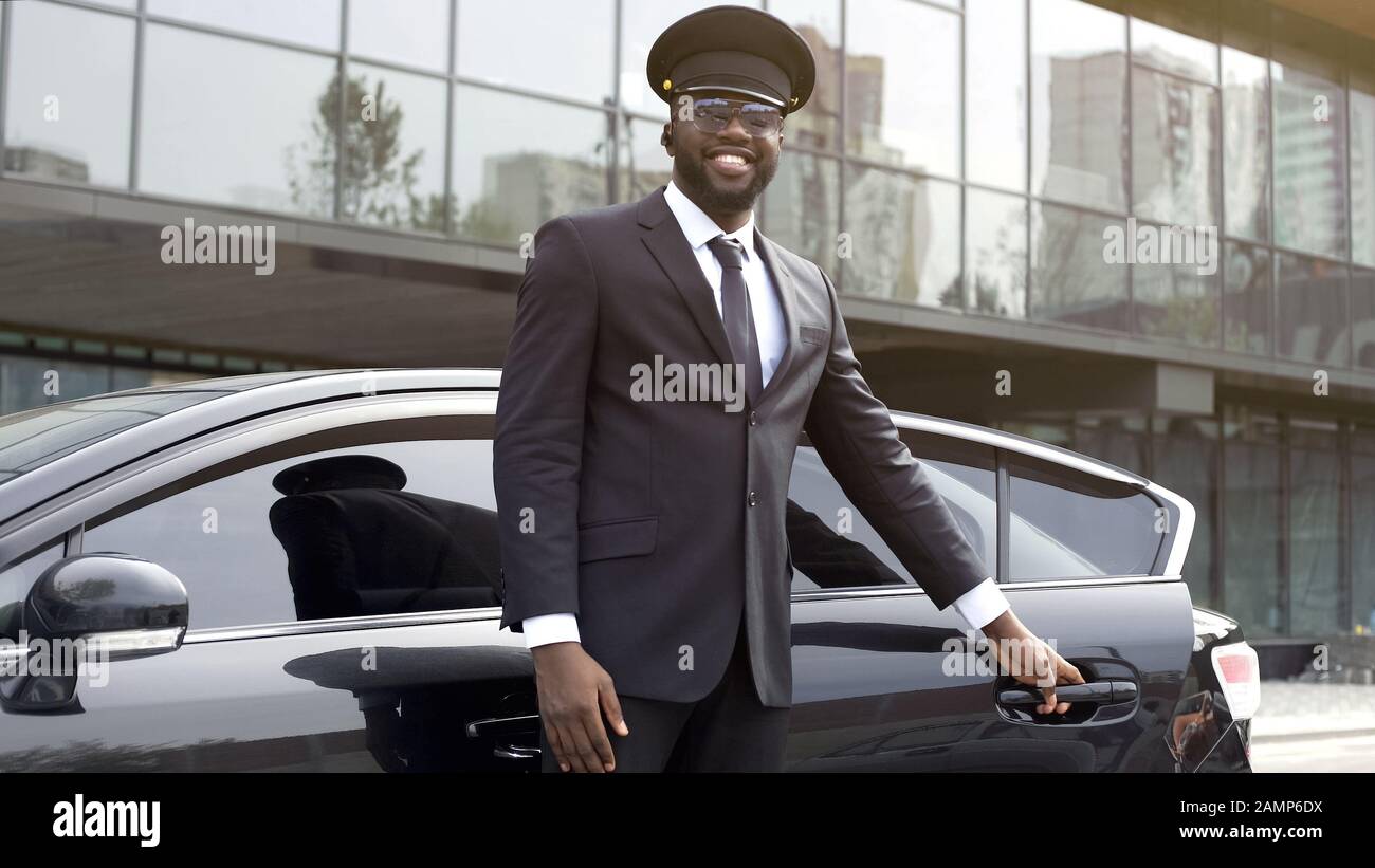 Vip passenger taxi driver politely opening car door for his client ...