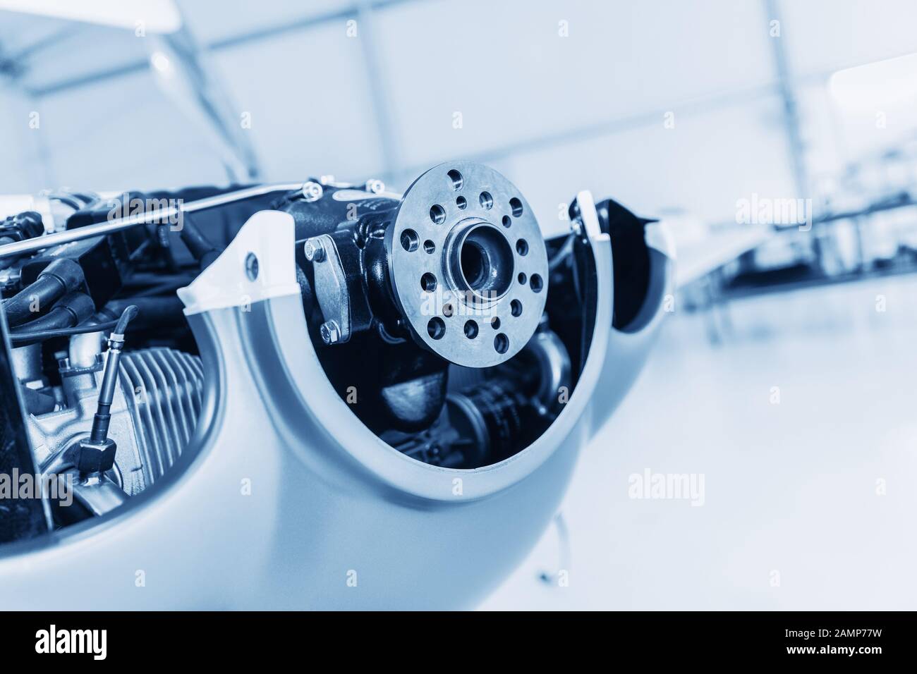 Detail of a small sports aircraft engine shaft. Ultralight aircraft in ...