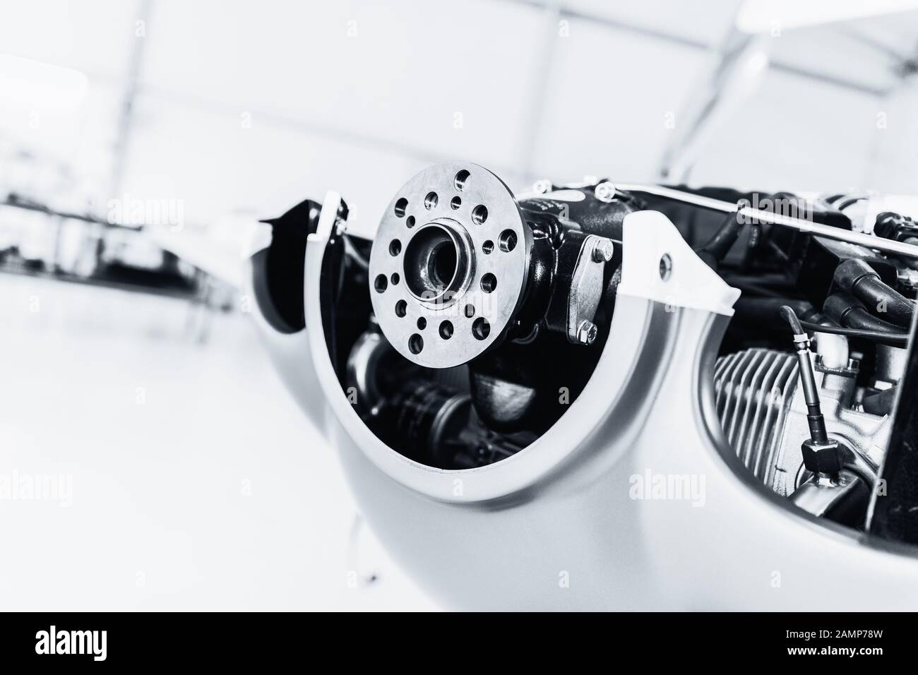 Detail of a small sports aircraft engine shaft. Ultralight aircraft in ...