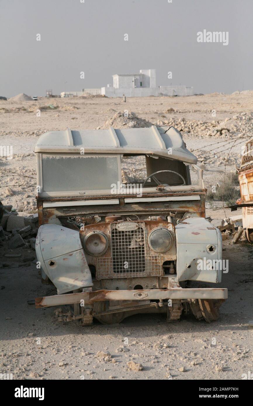 Land rovers on a scrap yard in the middle east Stock Photo - Alamy