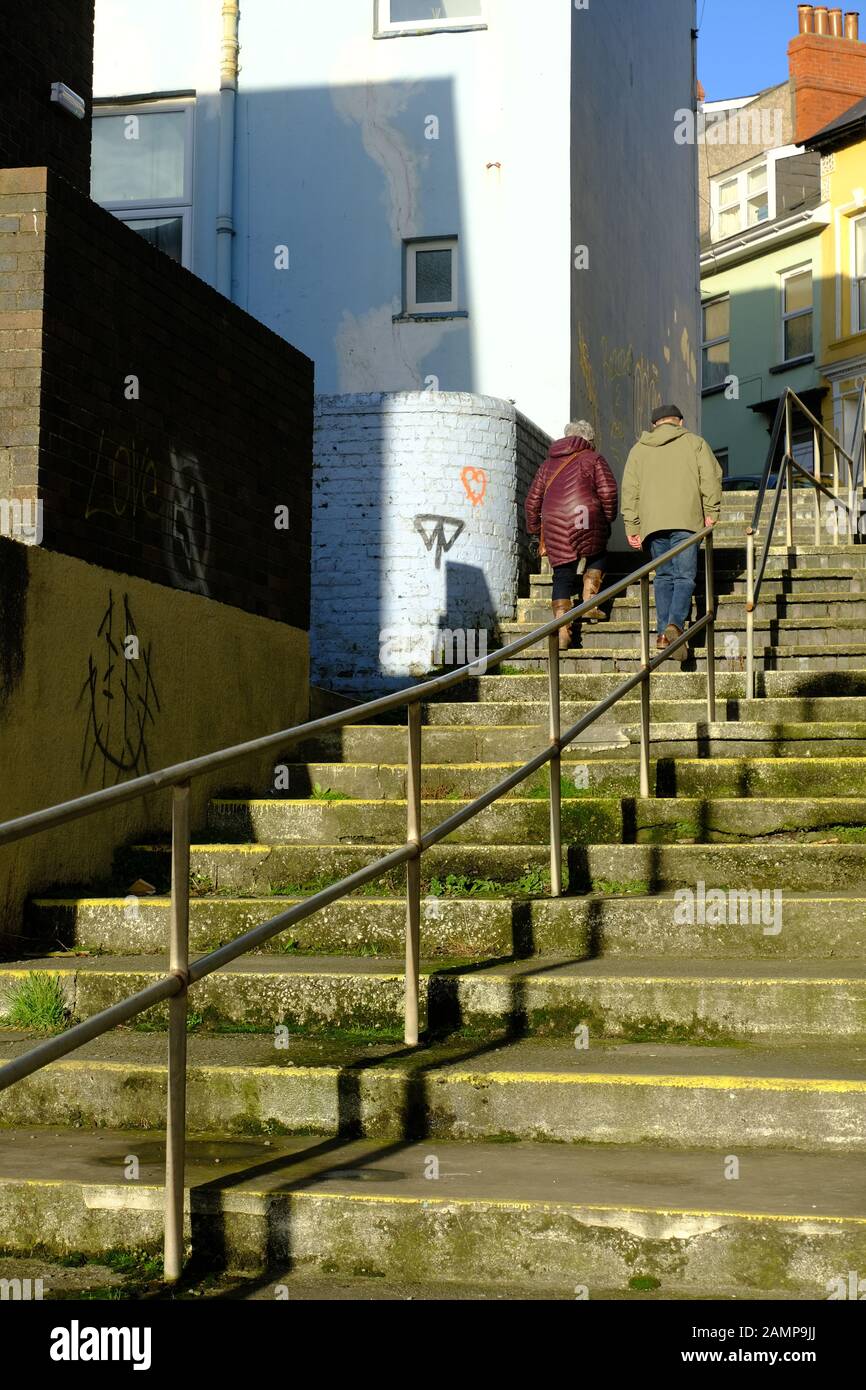 Elderly walking up steps hi-res stock photography and images - Alamy
