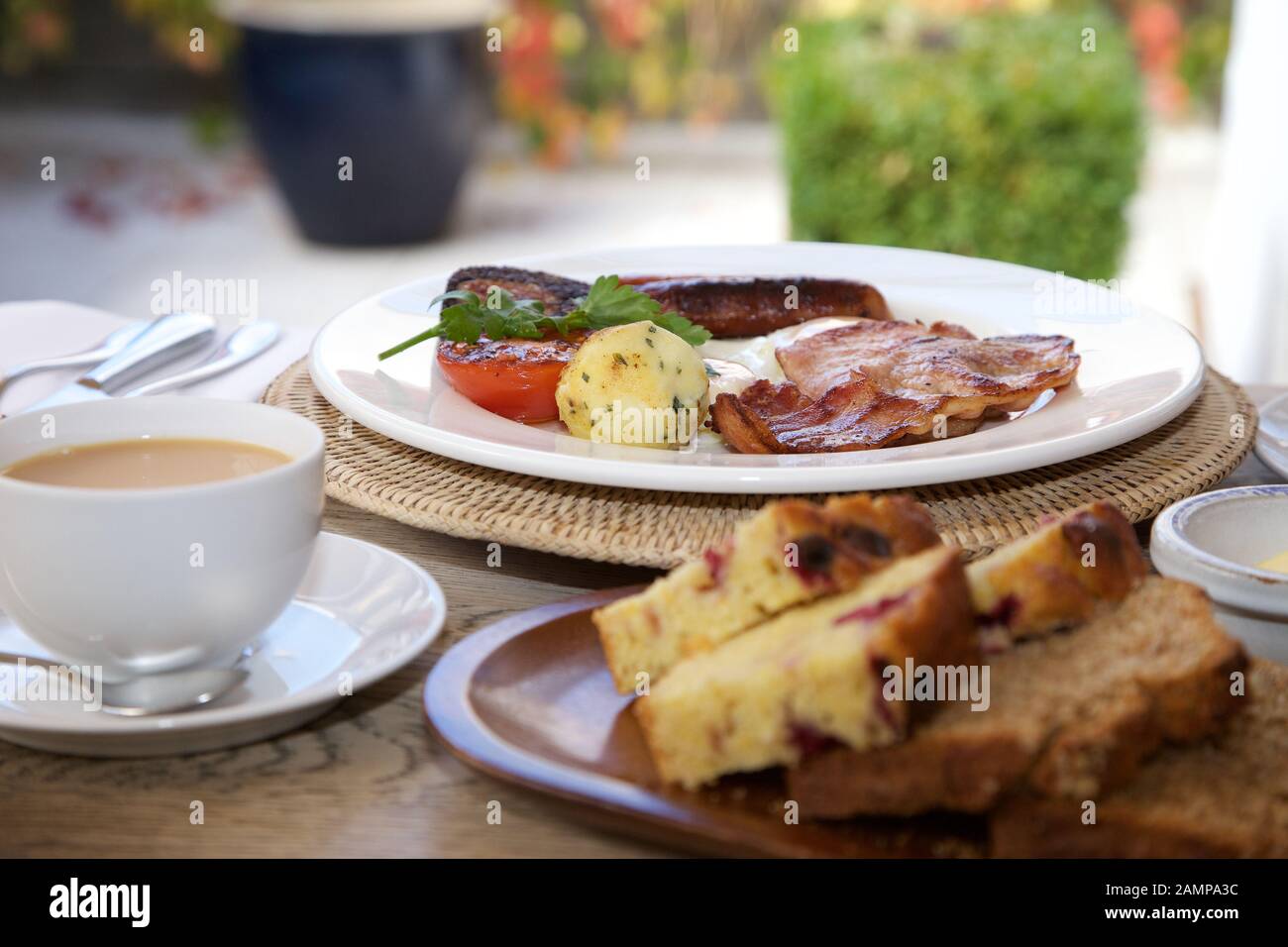A full Irish breakfast consisting of bacon, egg, sausage, black pudding ...