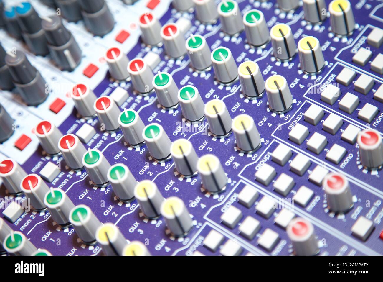 Close up of the knobs and switches on an audio mixing console Stock ...