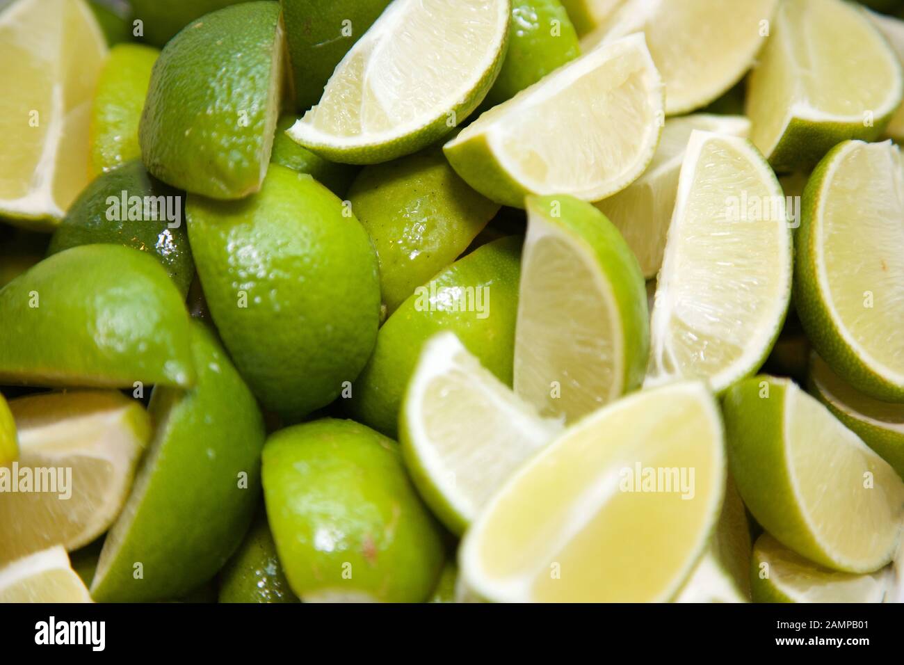 Food background - collection of vibrantly coloured lime wedges Stock ...