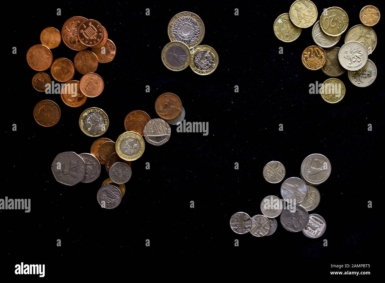 Pile of various types of coins of different shapes sizes and from ...