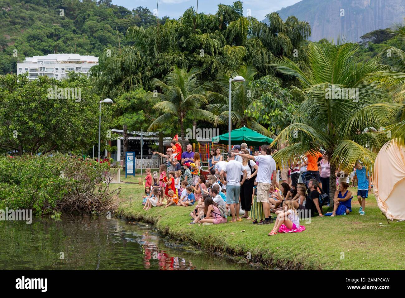 Families among palm trees with dressed up children of the Dutch ...