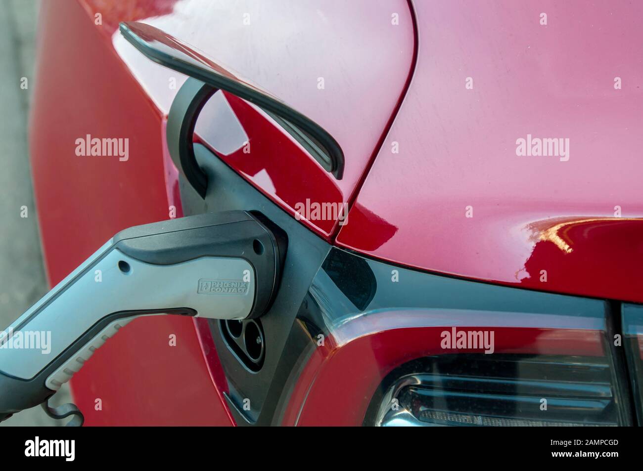 Tesla Model S. Plugged into charging port, in The Hague, The ...