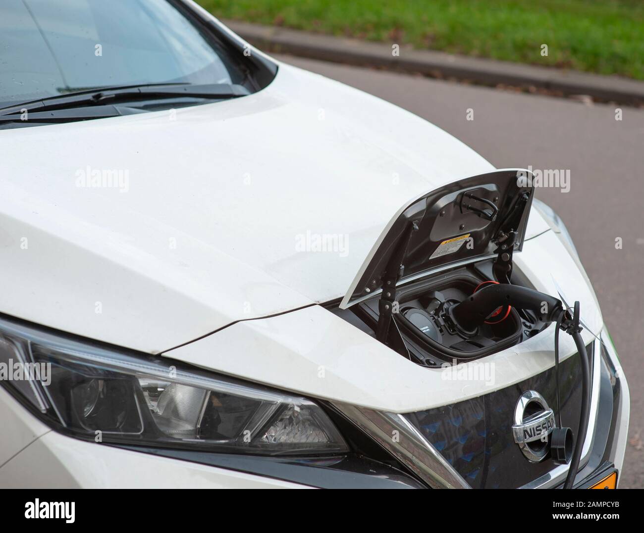 Nissan LEAF, plugged into charging port, in The Hague, The Netherlands ...