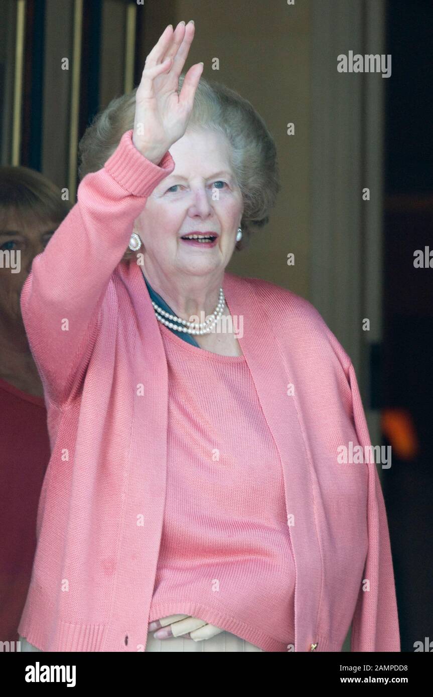 Baroness Thatcher smiling broadly and waving enthusiastically with her ...