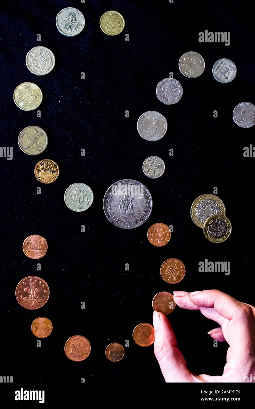 Various types of coins of different shapes, sizes and of different ...