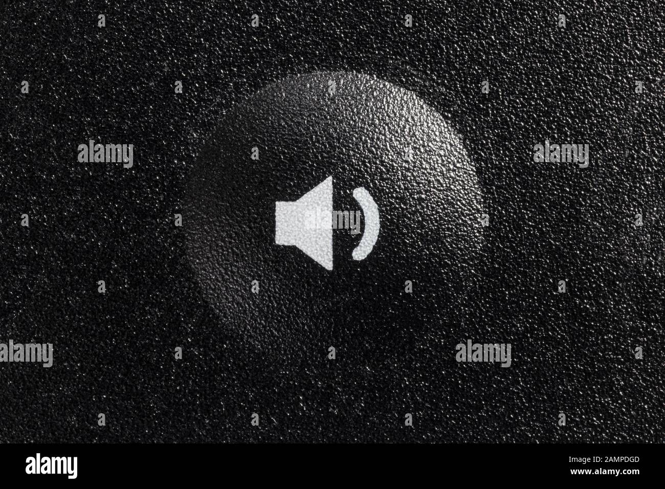 Low volume button on remote controller closeup macro photograph Stock ...