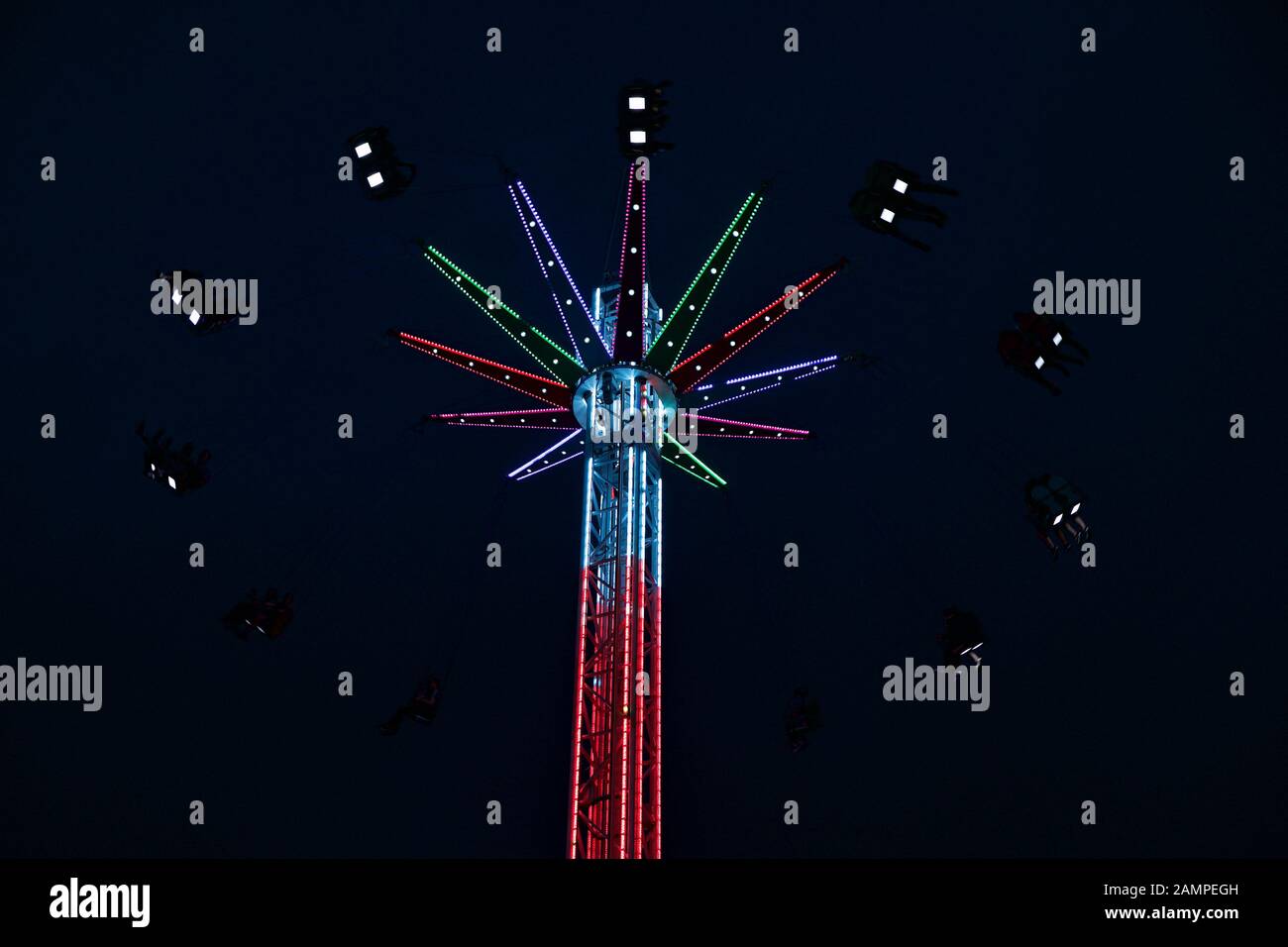 Amusement park high swing ride at night Stock Photo - Alamy