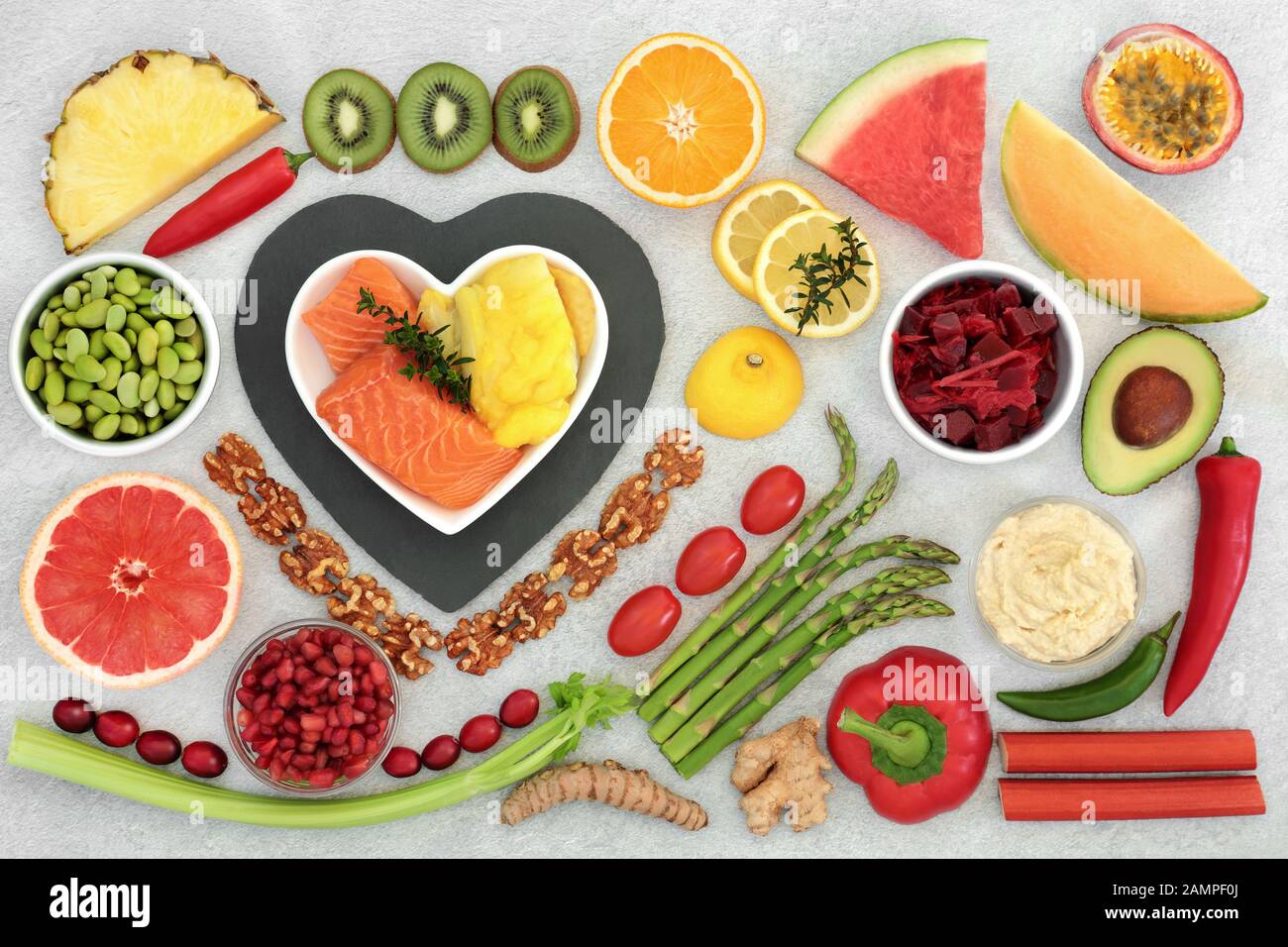 Healthy heart food with seafood, fruit, vegetables, nuts, herbs, spice ...