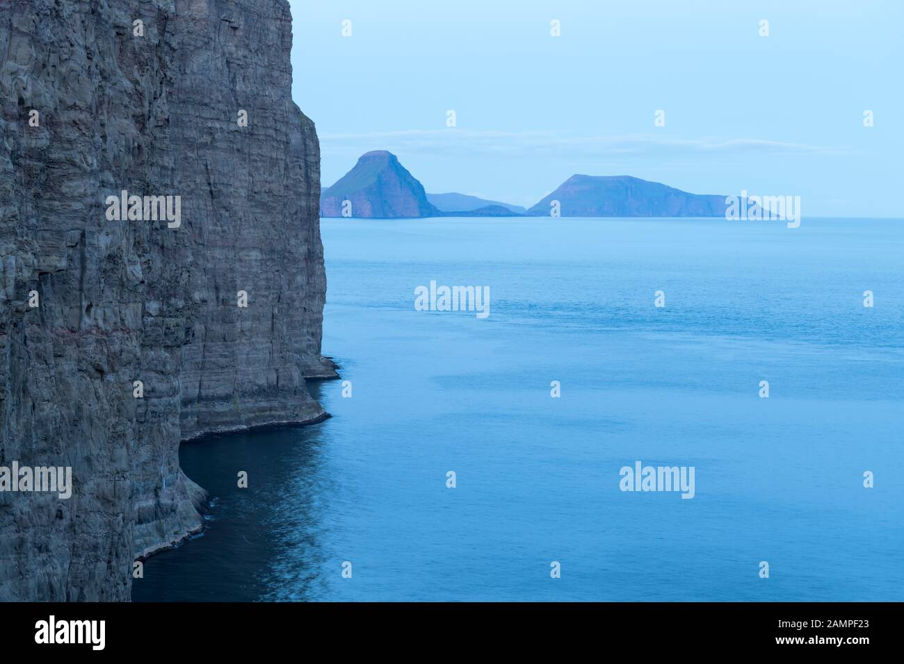 Evening view of islands in Atlantic ocean. Faroe Islands, Denmark ...