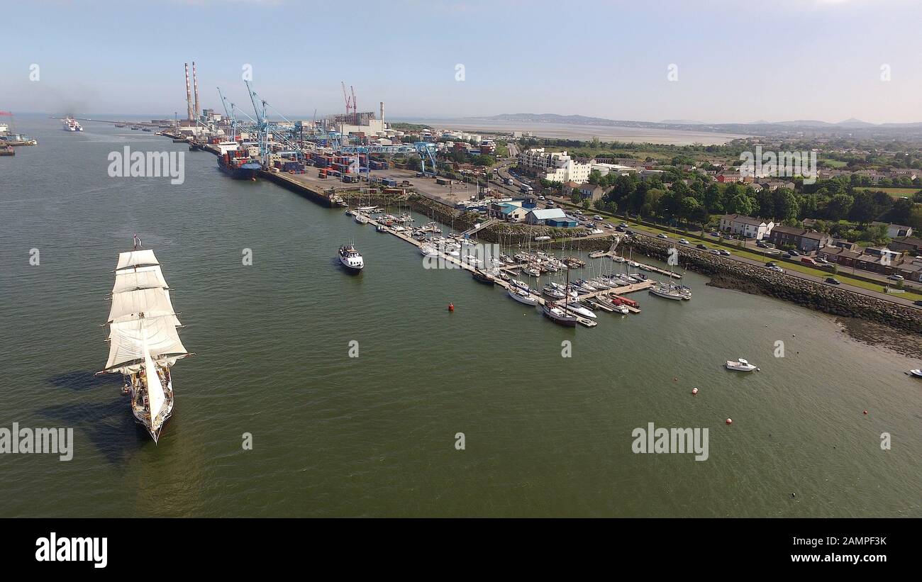 Drone aerial view of tall ships sailing through Dublin Port, Ireland ...