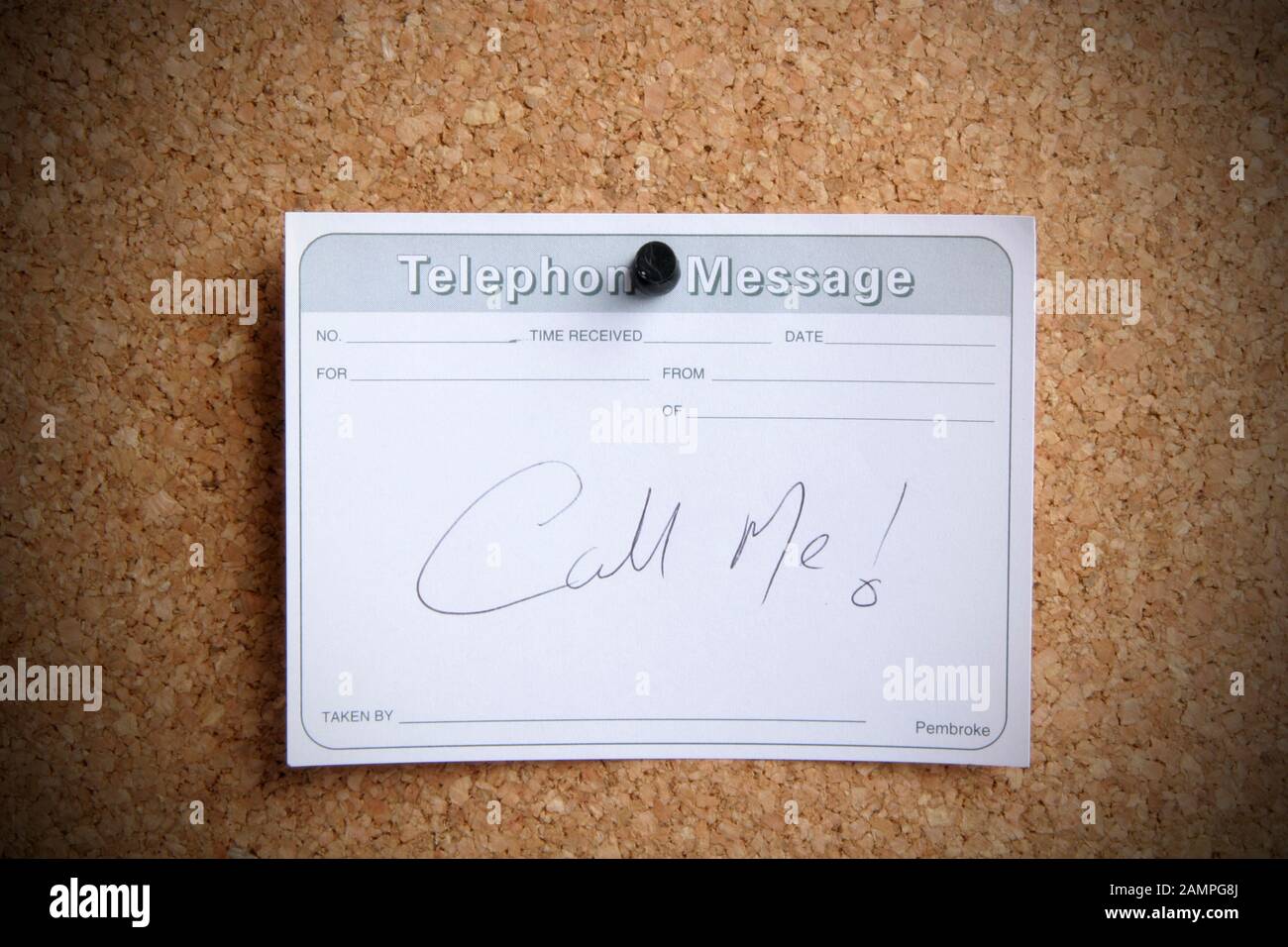 A handwritten call me note pinned on a message board Stock Photo - Alamy