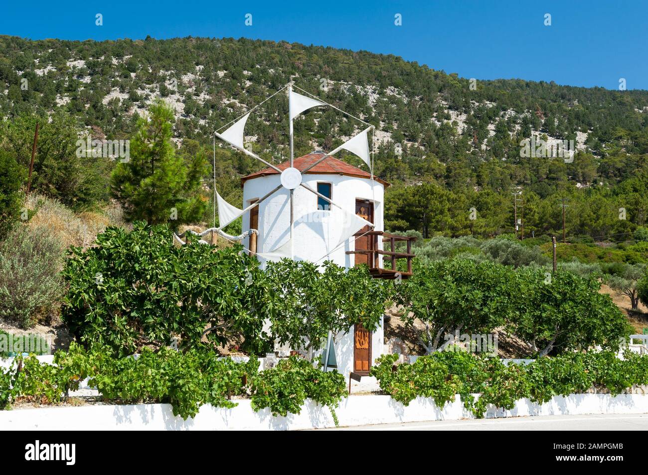 Old windmill turned into traditional greek restaurant in Monolithos ...