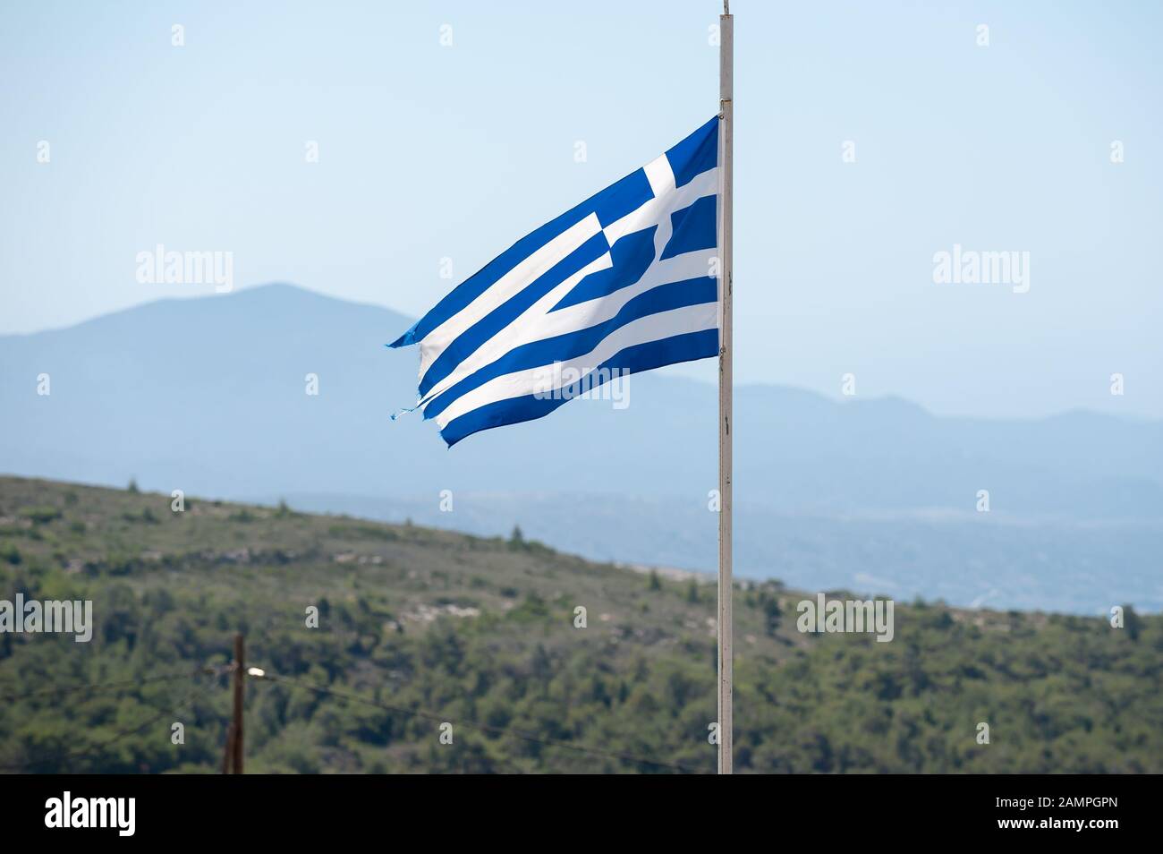 Greek flag near Monolithos, Rhodes, Greece Stock Photo - Alamy