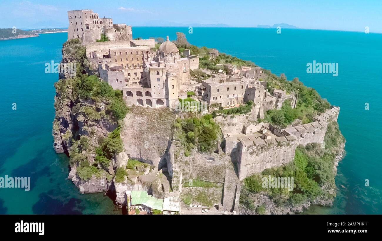 Italian tourist attraction, medieval Aragonese Castle in Ischia, aerial ...