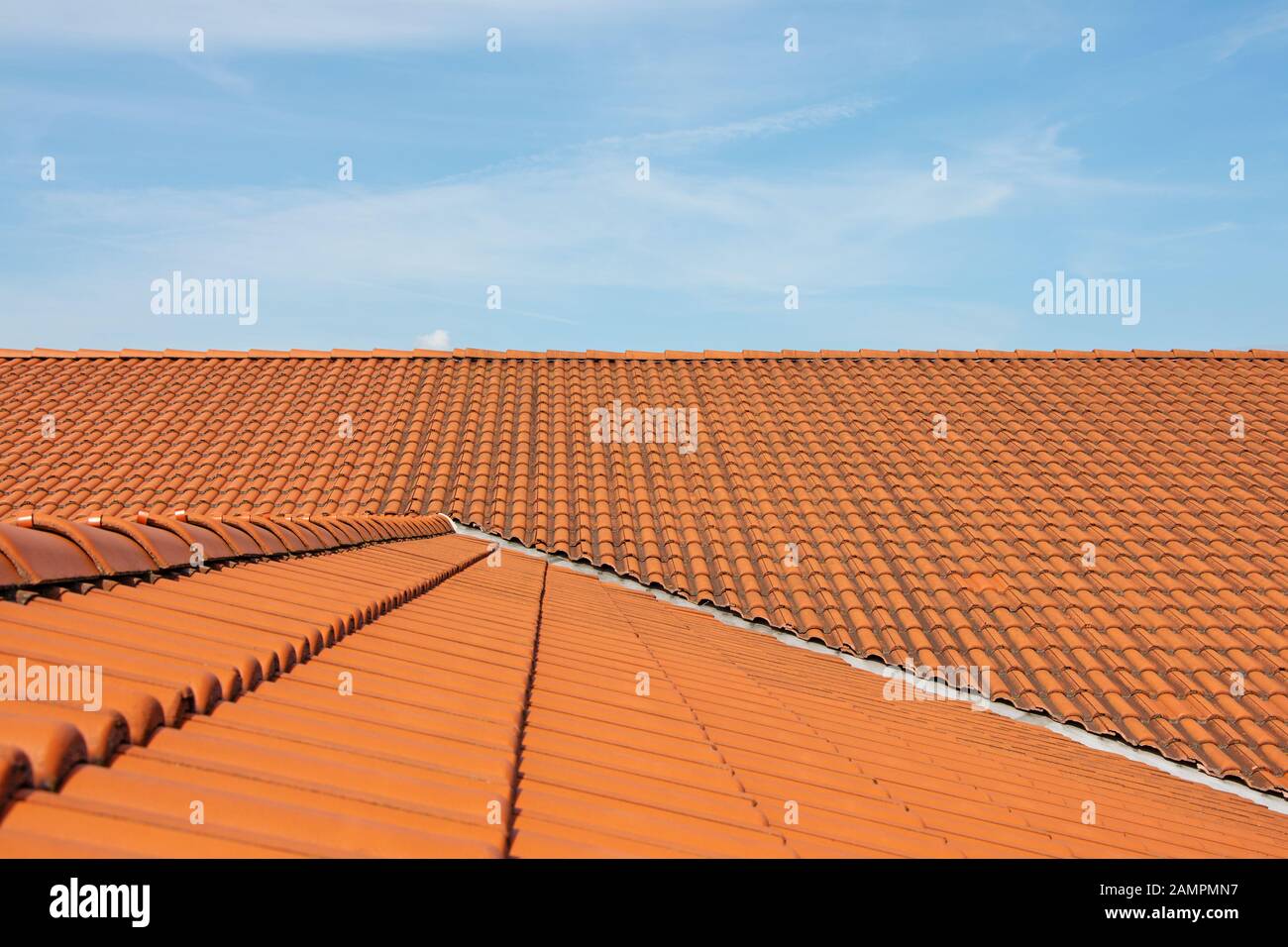 Building roof with red tiles Stock Photo - Alamy
