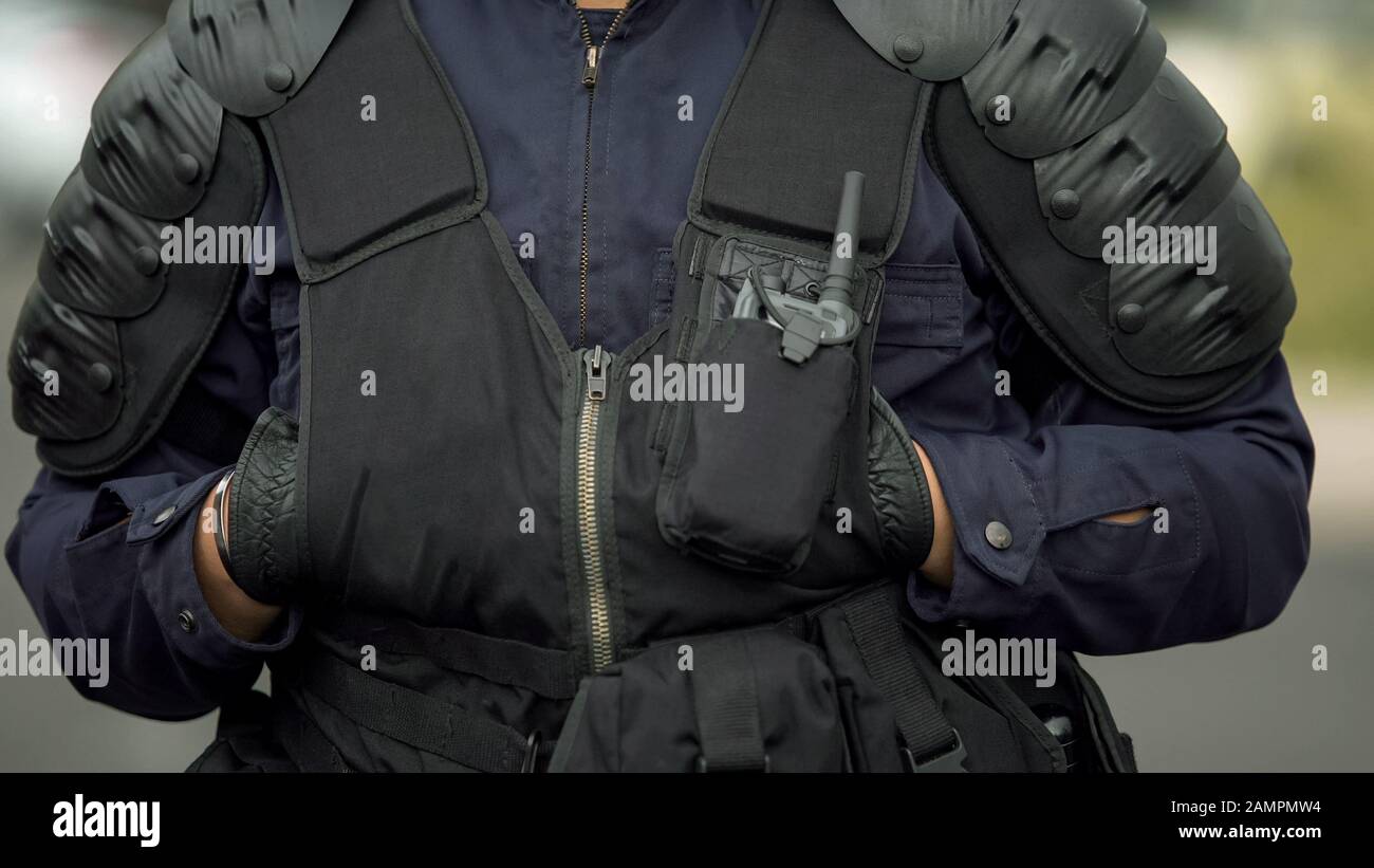 Police officer monitoring order and eliminating offenders on roads and ...