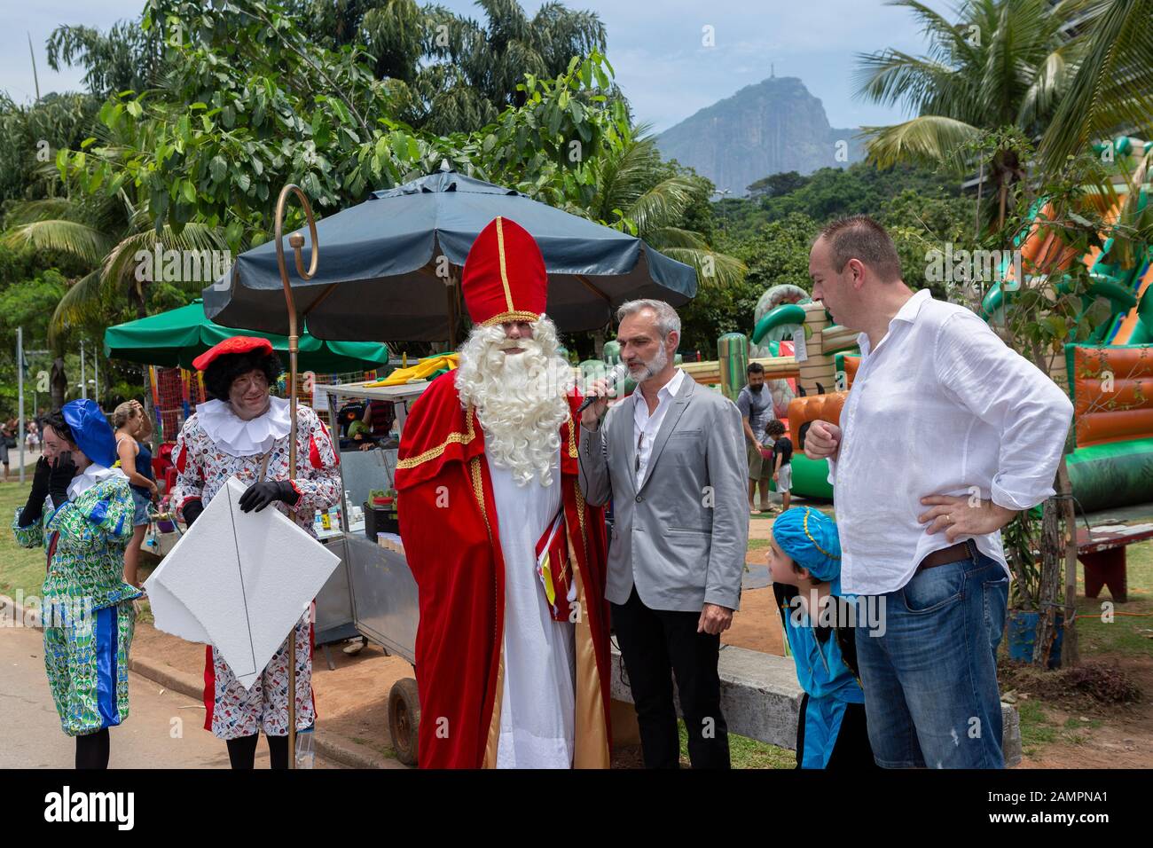 Sinterklaas and his assistants arriving on the city lake shore in Rio ...