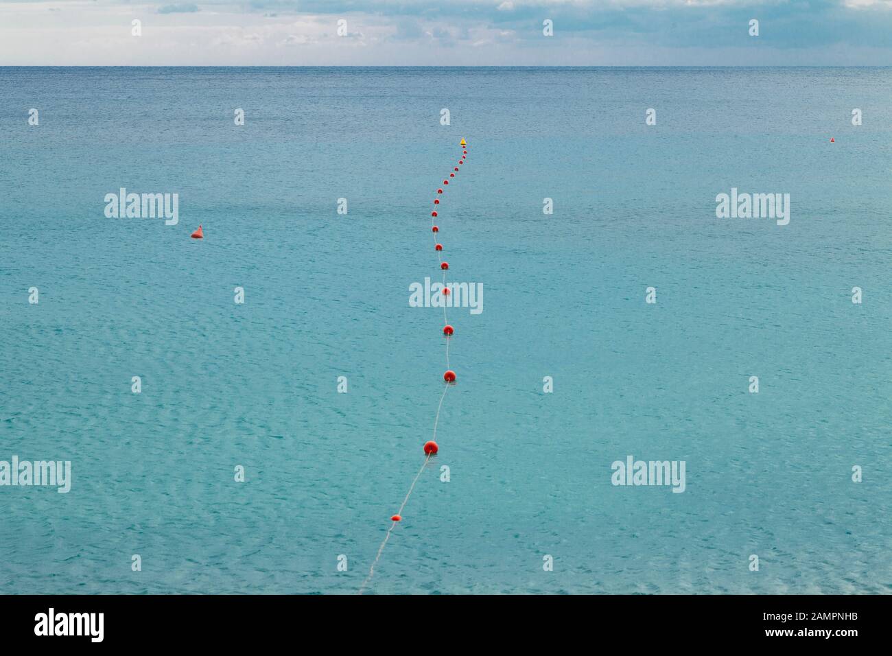 LIne of bouys stretching out into the Mediterranean sea Stock Photo - Alamy