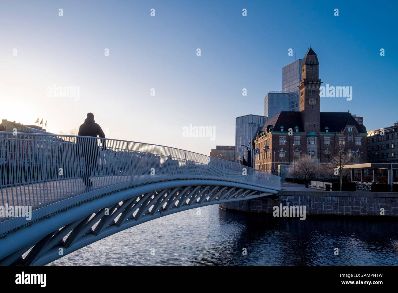 Malmo, Sweden, in winter - man crossng bridge at harbour Stock Photo ...