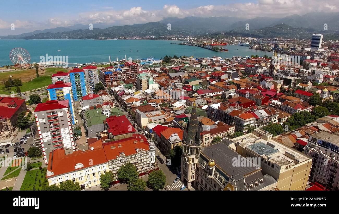 Batumi cityscape with rooftop and Black Sea, mountains creating skyline ...