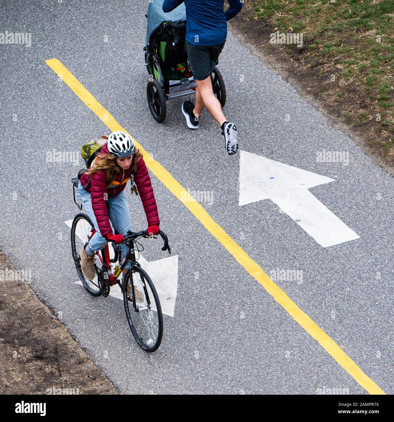 Cyclist riding on a shared pathway Stock Photo - Alamy