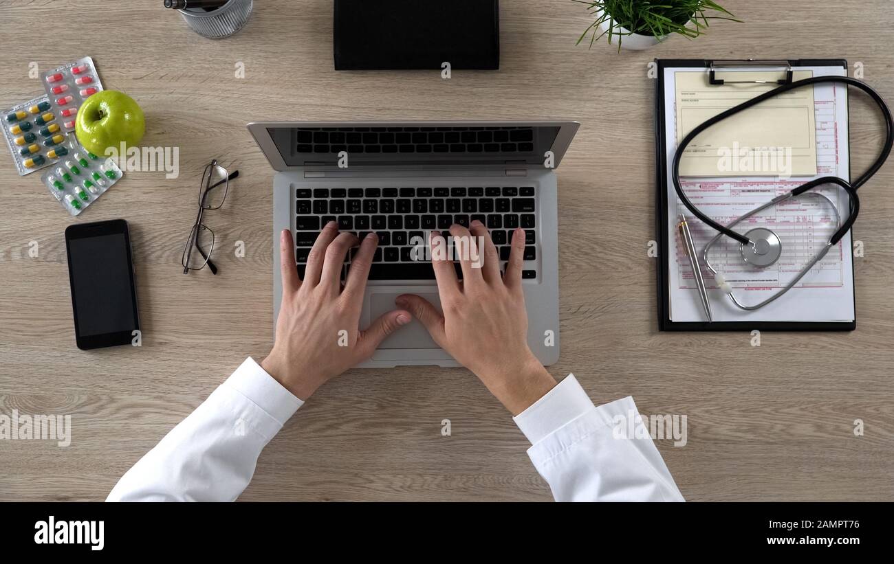 Top view doctor hands typing hi-res stock photography and images - Alamy