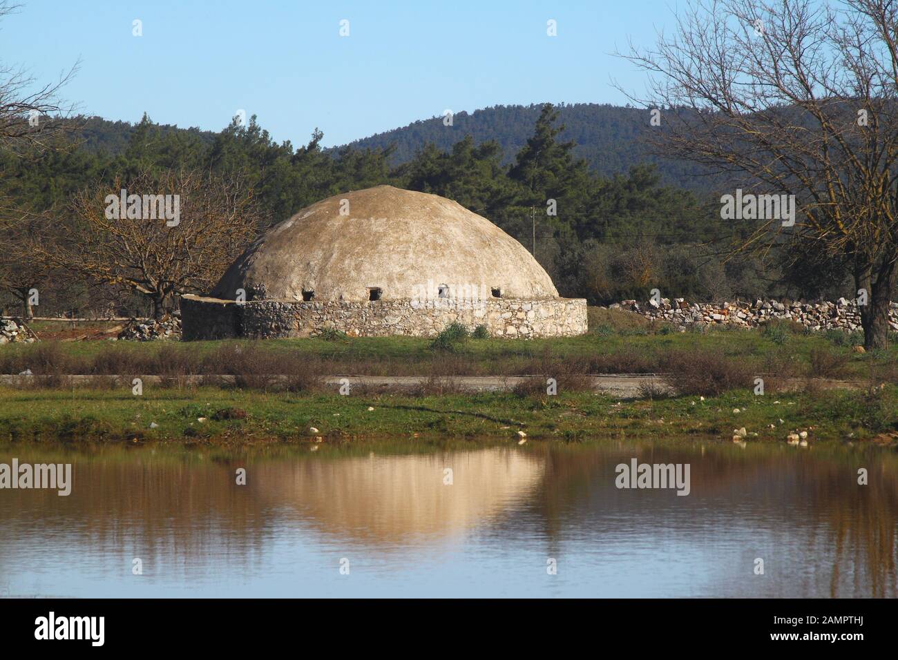 An old house built with bricks and stone A simple village architecture ...