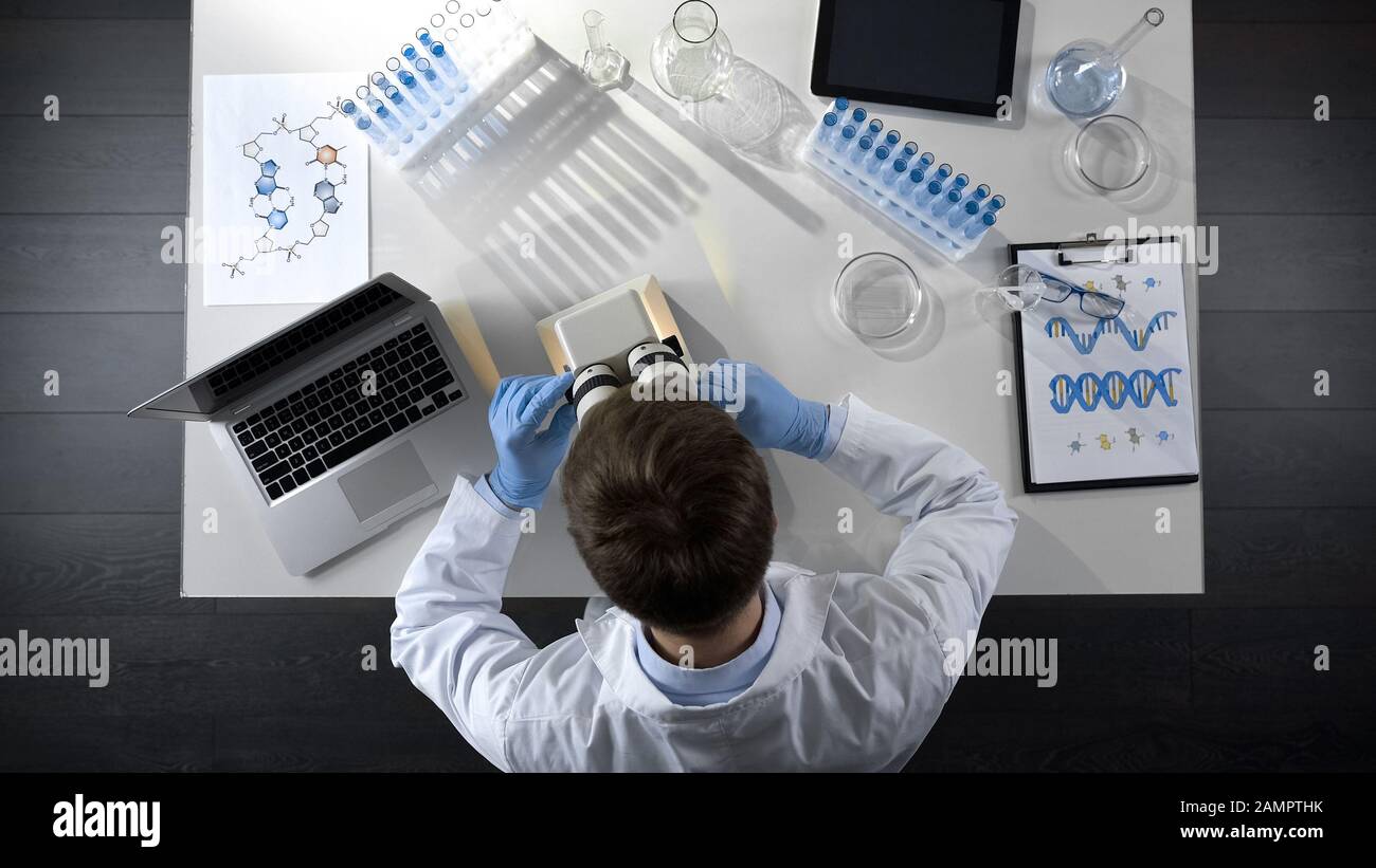 Technologist with microscope hi-res stock photography and images - Alamy