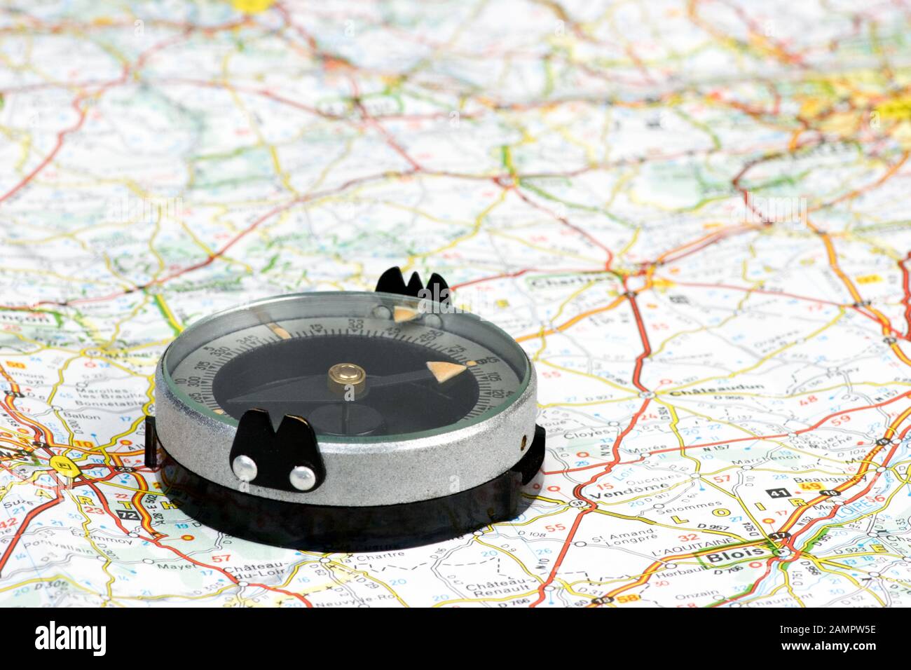 Navigation with compass and map Stock Photo - Alamy