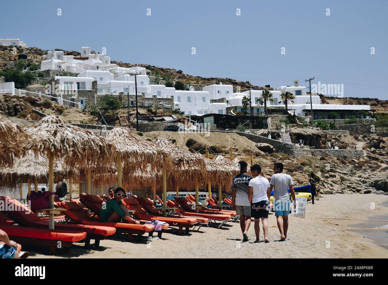 People walking in the beach Stock Photo - Alamy