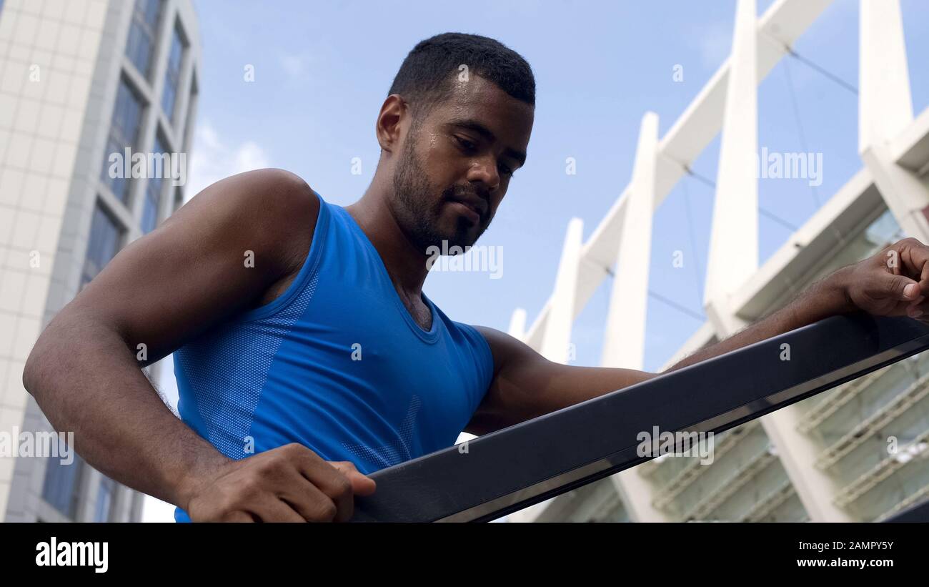 Sportsman practicing breathing exercises on hi-res stock photography ...