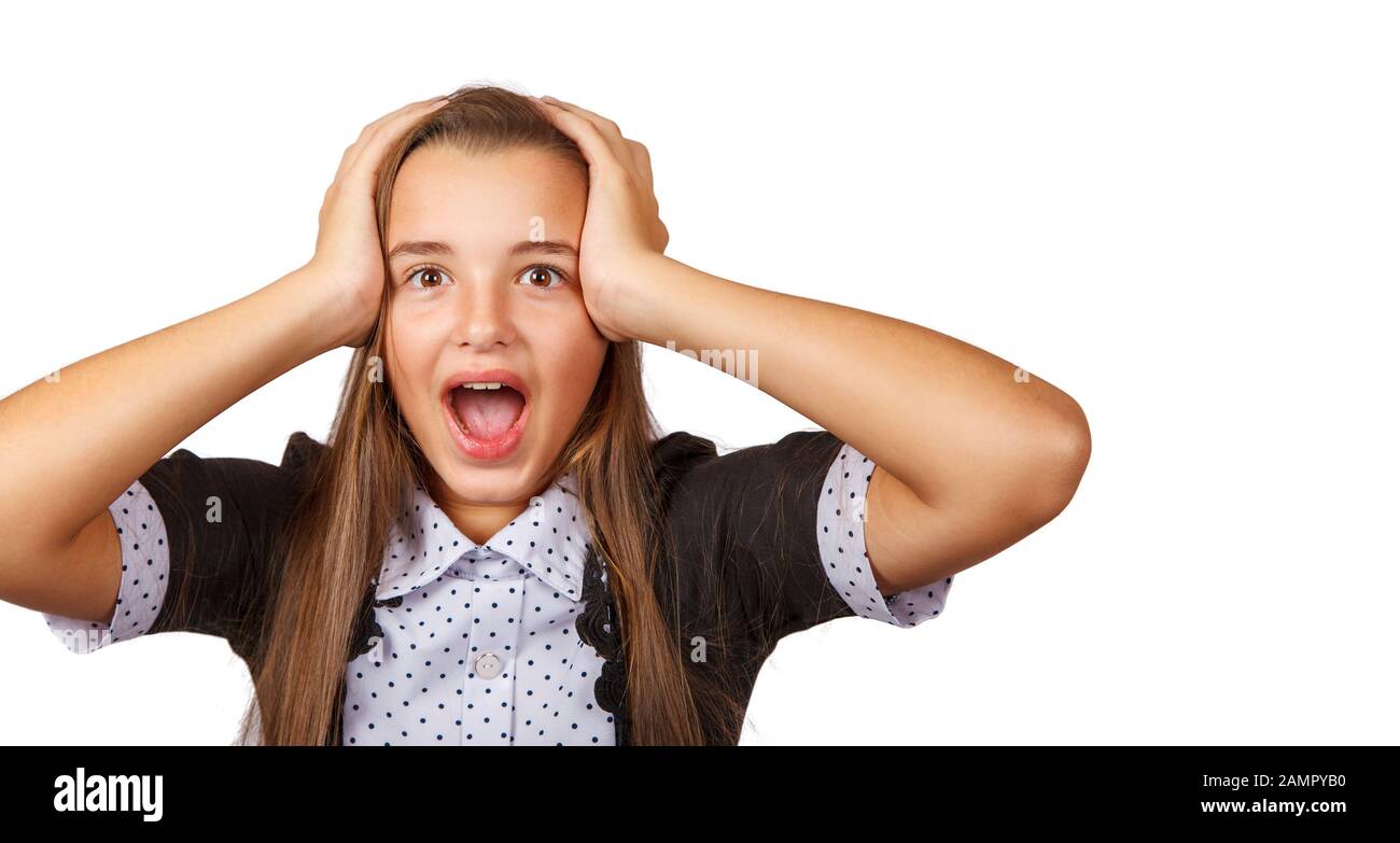 surprised beautiful brunette teen girl screaming in delight. isolated ...