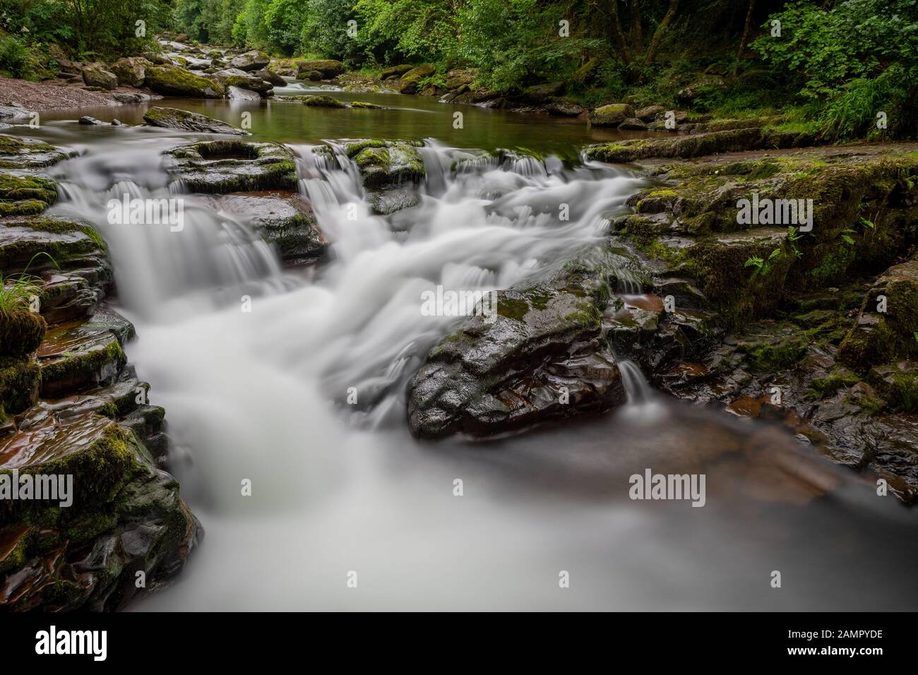 Long exposure of the waterfall at Watersmeet bridge pool at Watersmeet ...