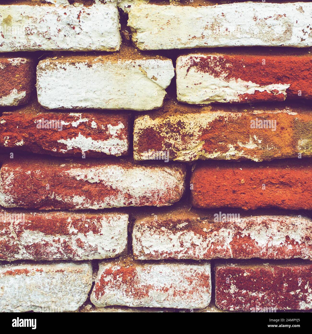 Brick wall with large gaps, old red and white bricks Stock Photo - Alamy