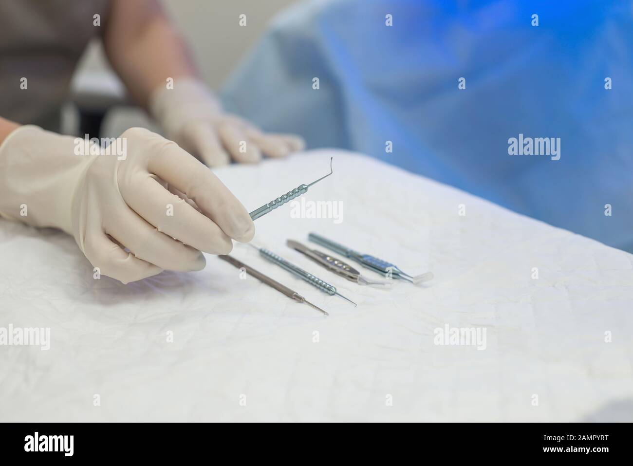 Close-up of an ophthalmologist doctor holding instruments for ...