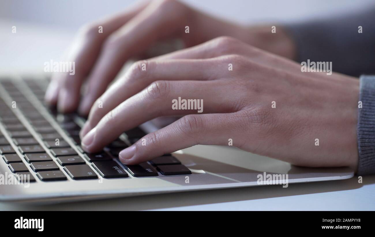 Journalist or writer typing text on laptop, using modern technologies ...