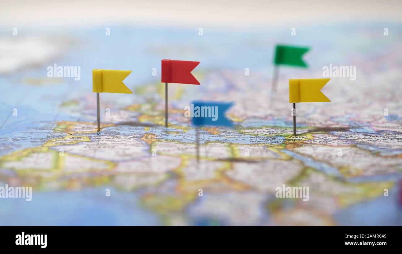 Pins mark cities and towns in countries on world map, mobile network ...