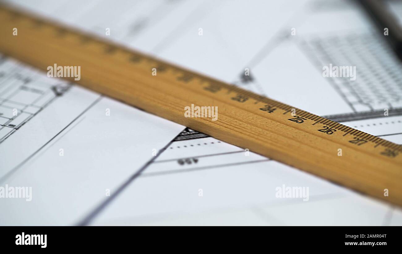 Ruler on documents with building plan, architecture design, distance ...