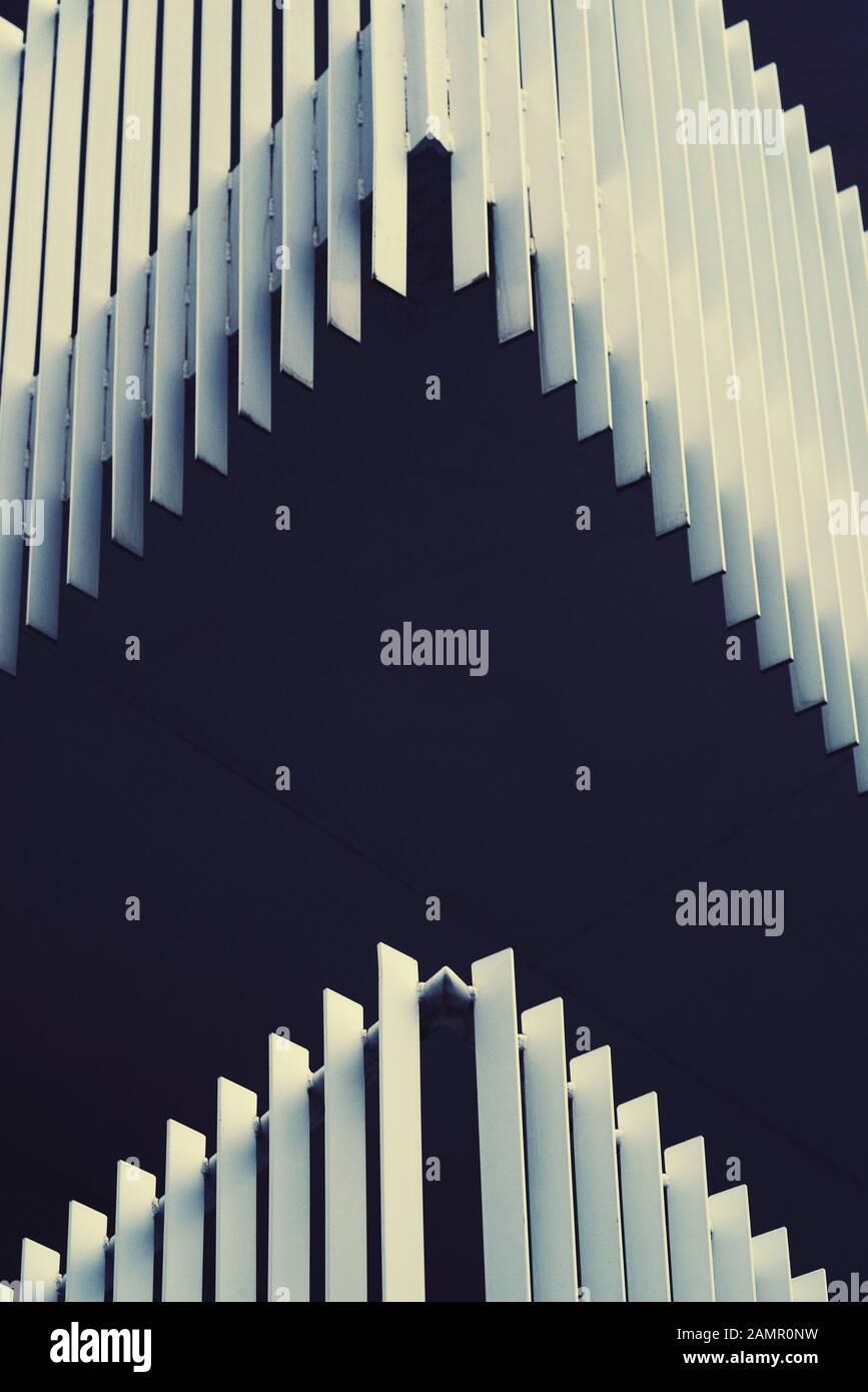 Abstract pattern of metal slats forming privacy railings on modern ...