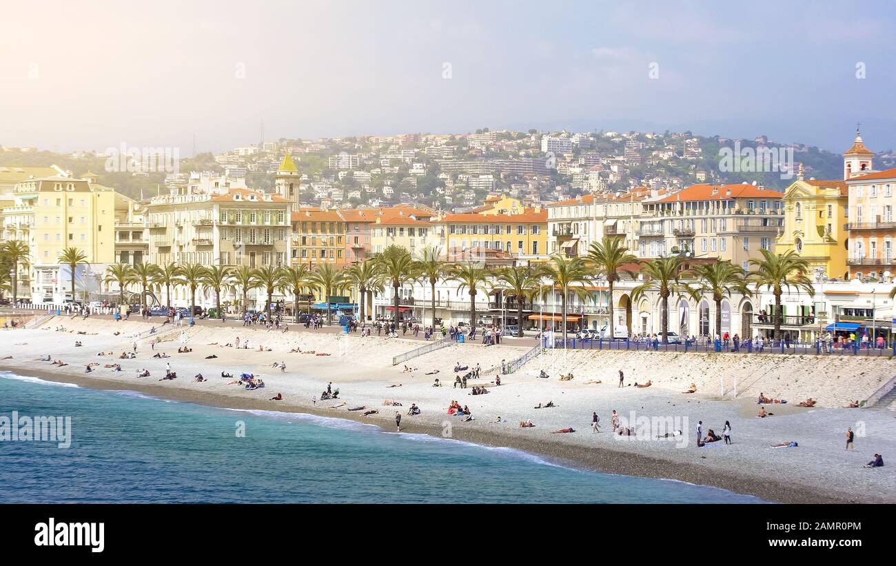 Summer holidays in Nice, people sunbathing on summer beach, sunny ...