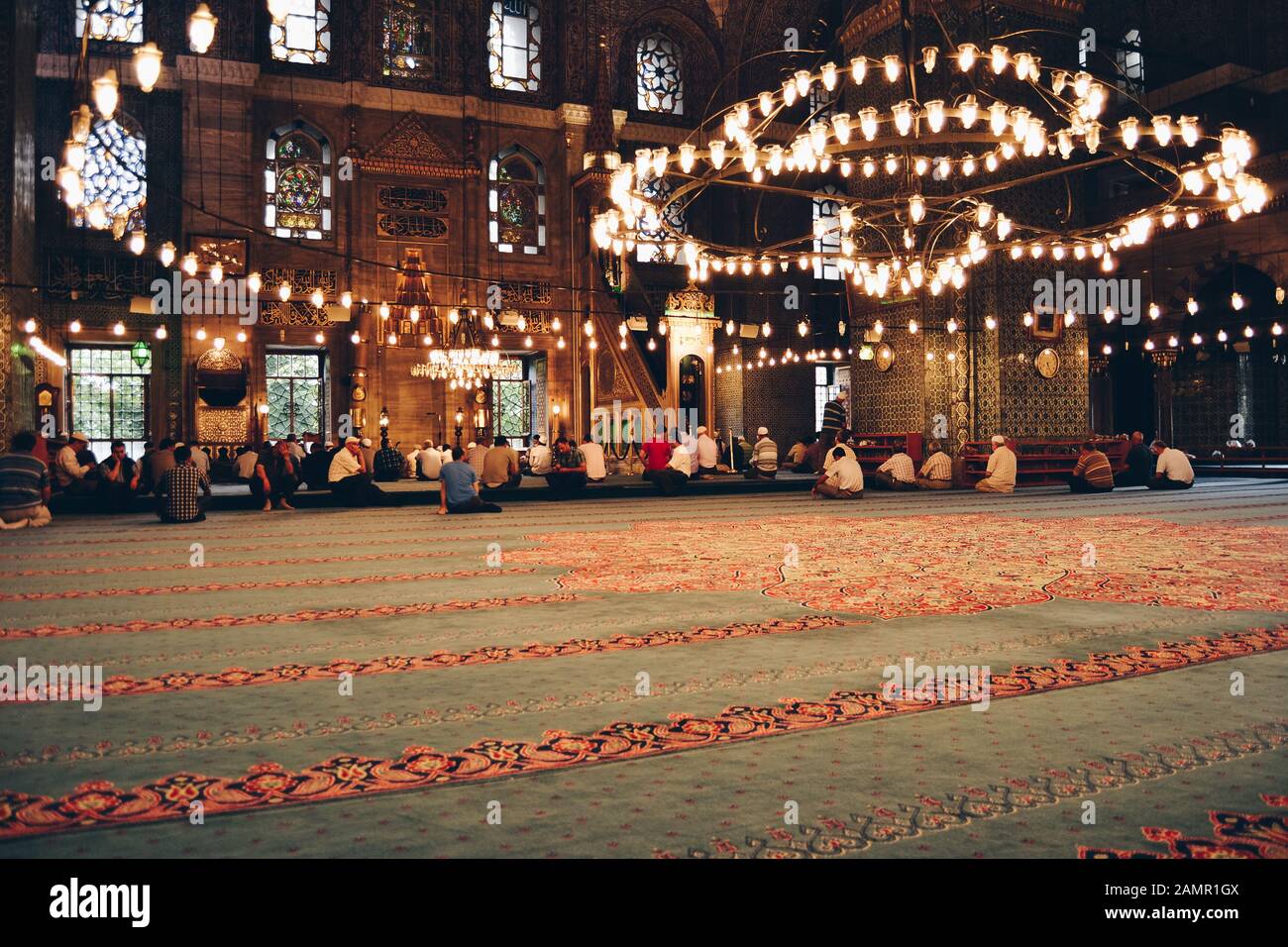 People praying inside the New Mosque Stock Photo - Alamy