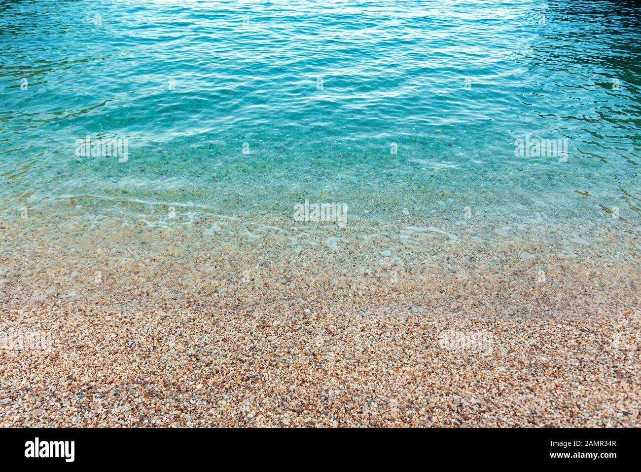 sea water background with pebbles. Ionian sea, Greece Stock Photo - Alamy